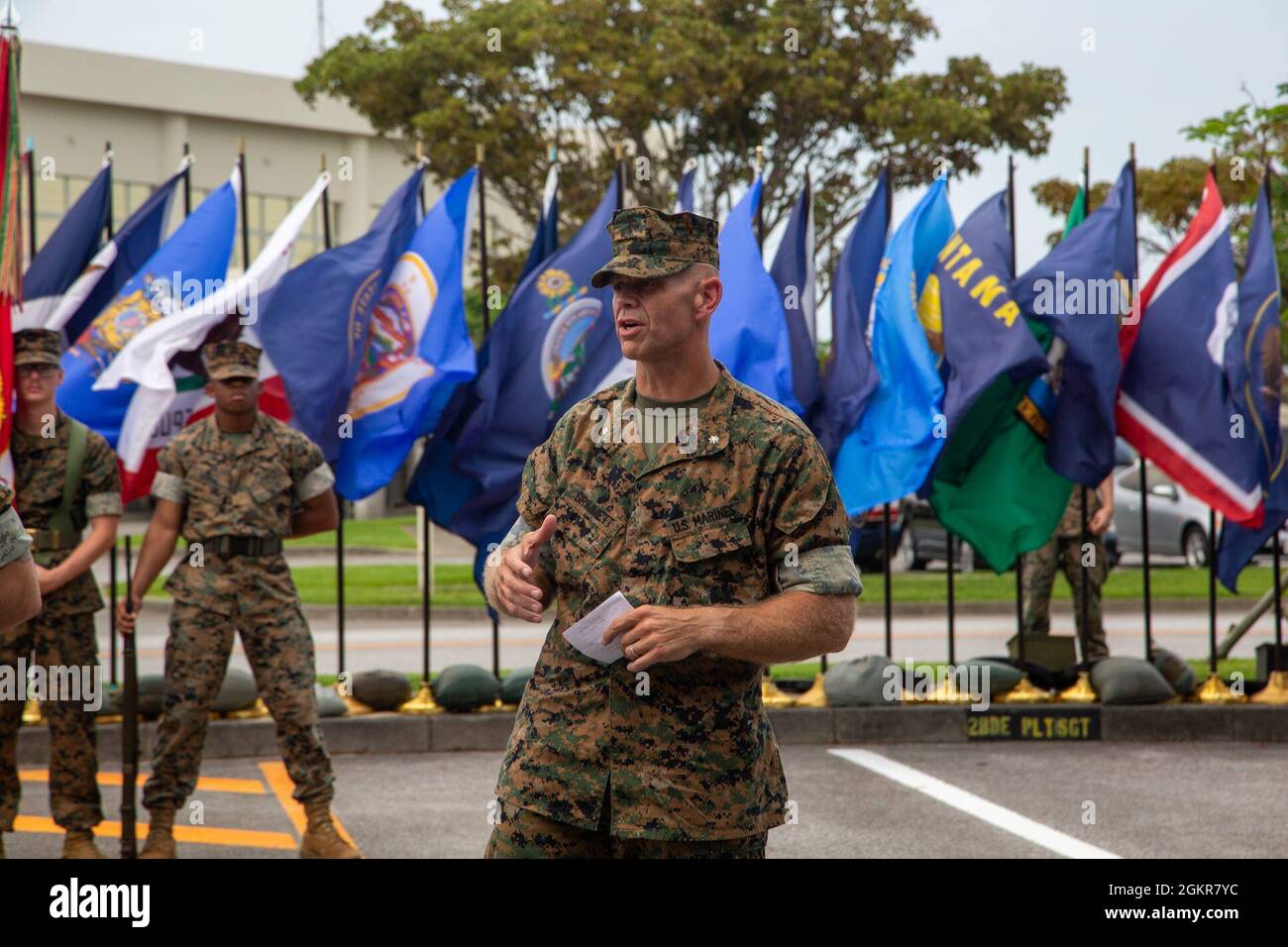 U.S. Marine Lt. Col. Chad R. Grimmett, outgoing battalion commander ...