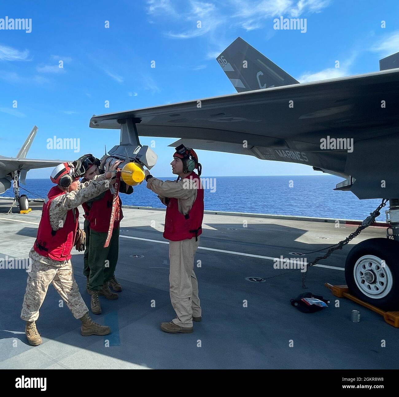 U.S. Marines With Marine Fighter Attack Squadron (VMFA) 211, Carrier ...