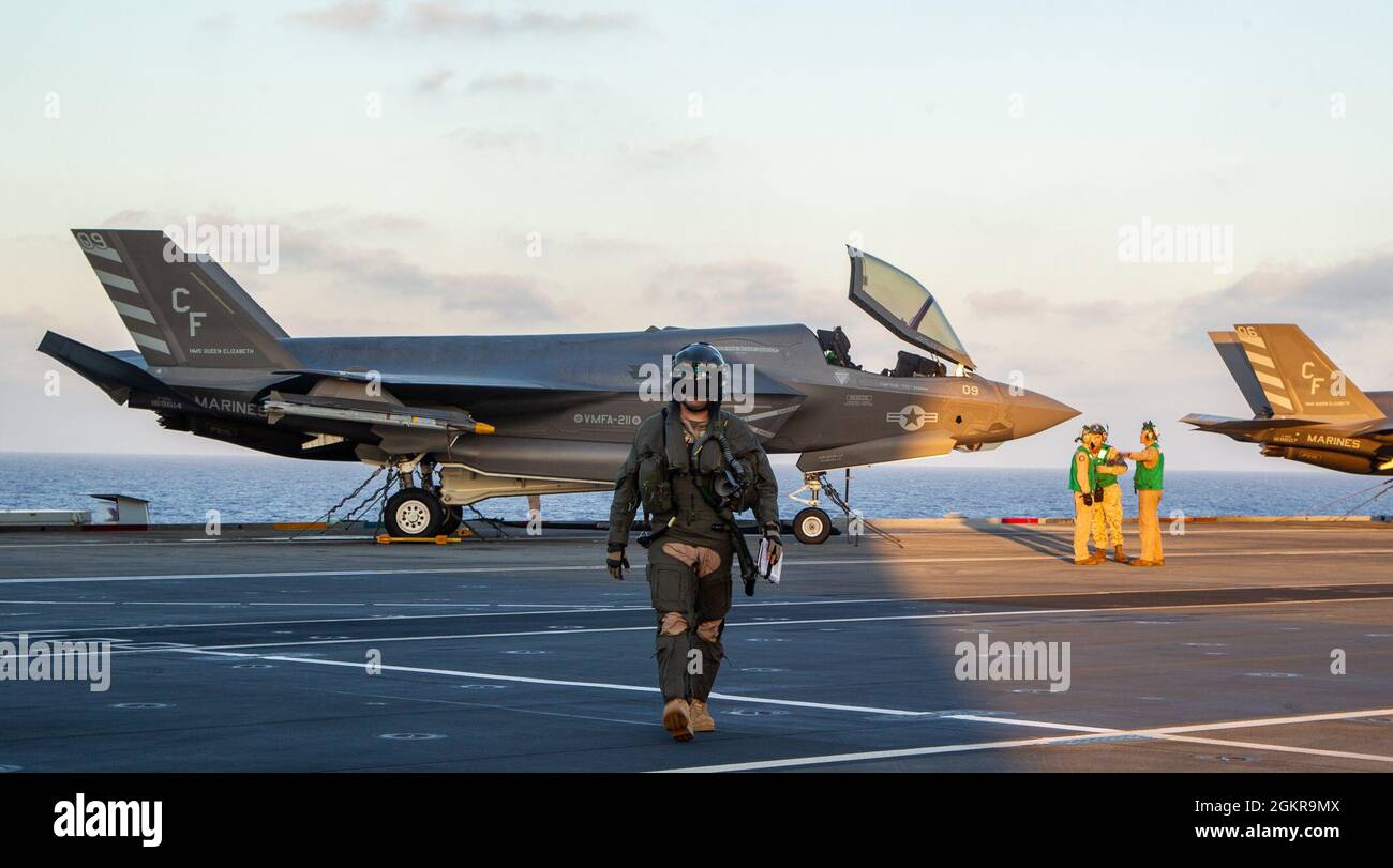 A U.S. Marine with Marine Fighter Attack Squadron (VMFA) 211, Carrier ...