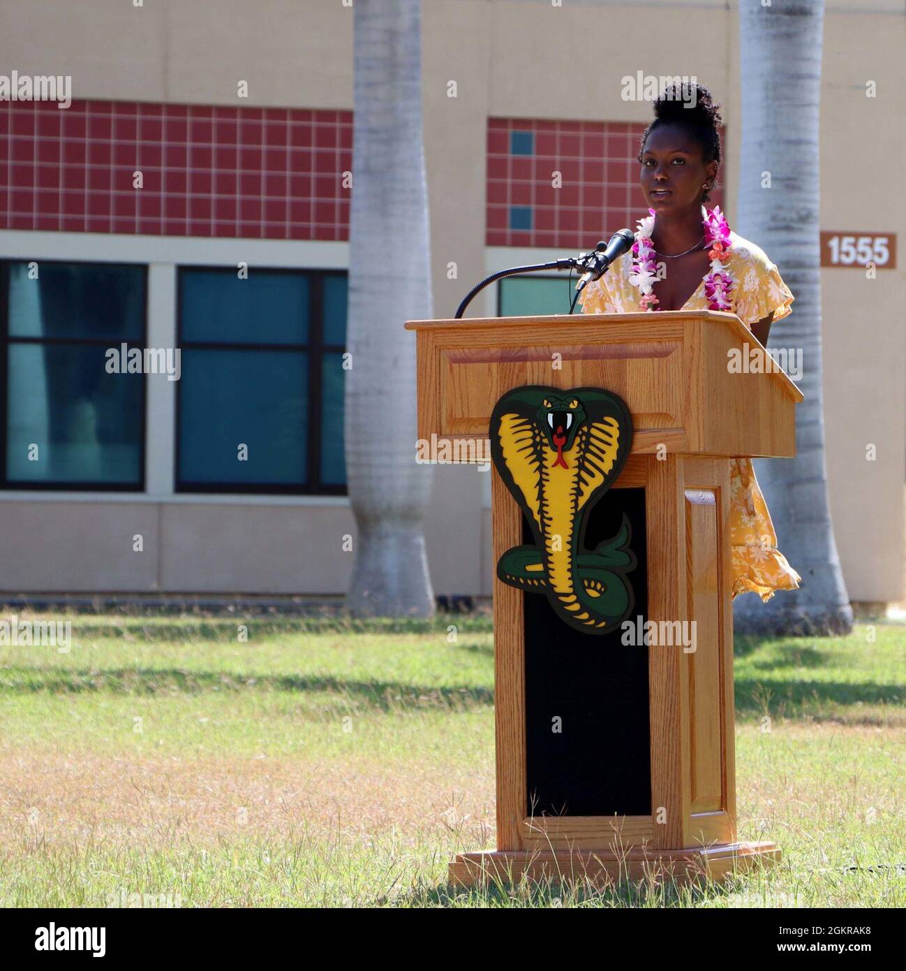Alana Young, daughter of Lt. Col. Brian Young, sings the National ...