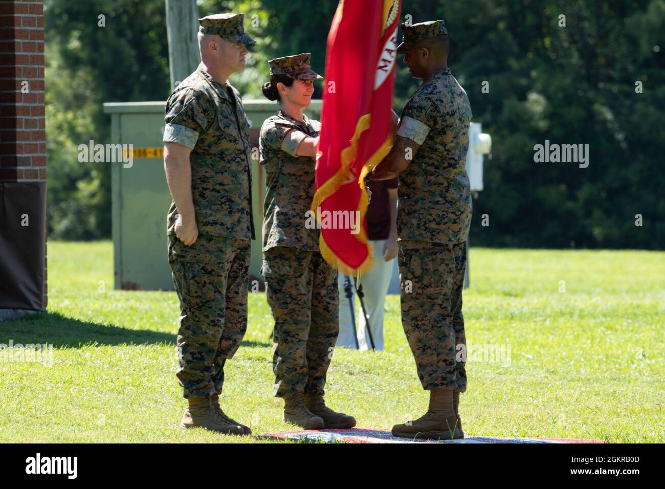 U.S. Marine Corps Lt. Col. Cameron A. Fitzsimmons, center, incoming ...
