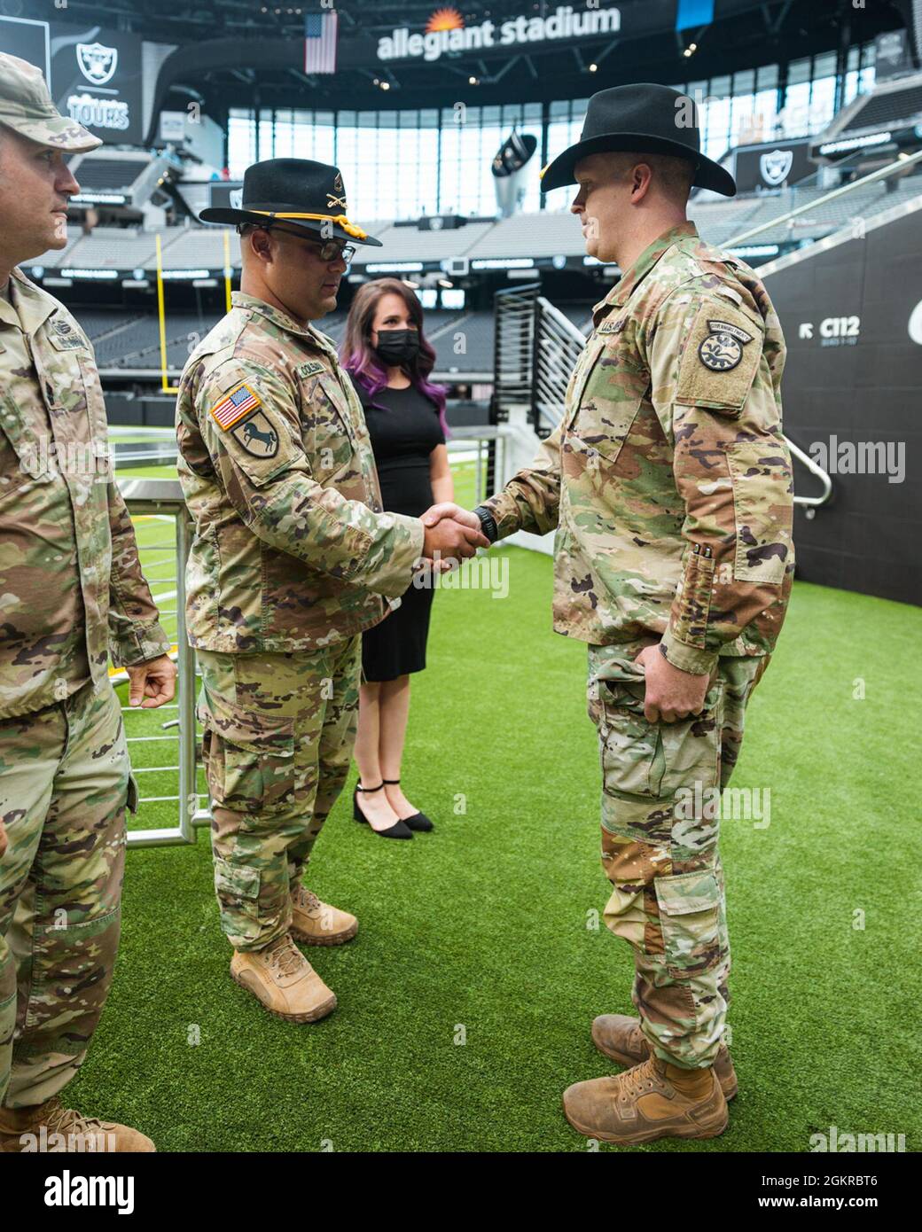 Sgt. 1st Class Jordan Coleman (left) congratulates Staff Sgt. Robert ...