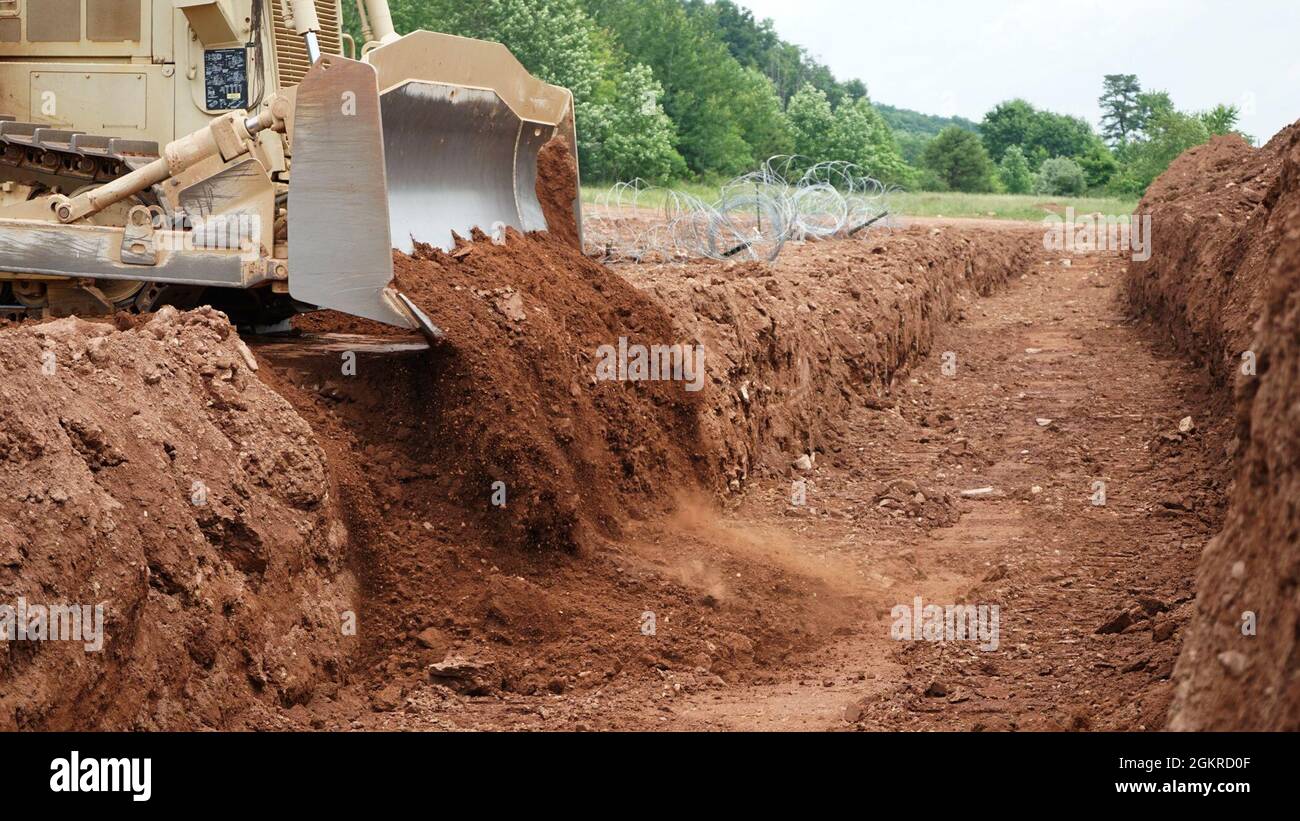 A Soldier from the 228th Engineer Company, 337th Engineer Battalion ...