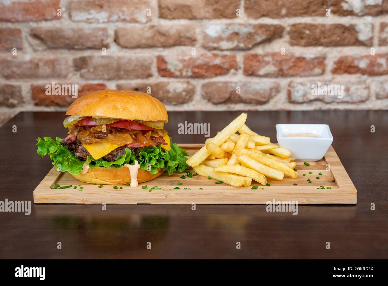 Classic Beef Burger with Stewed Onions, Pickles, Lettuce, Melted ...