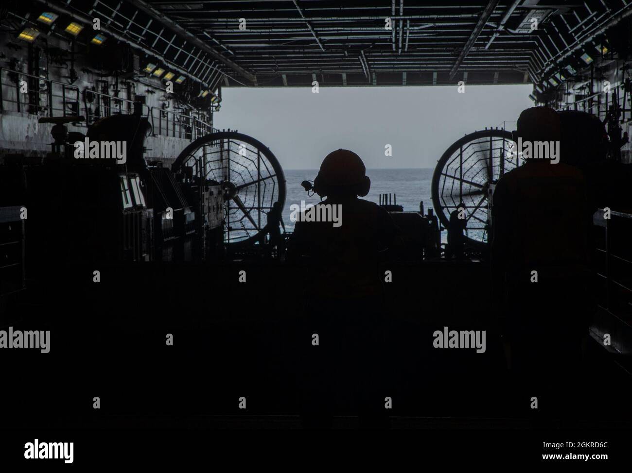U.S. Marines and Sailors aboard the amphibious assault ship USS New ...