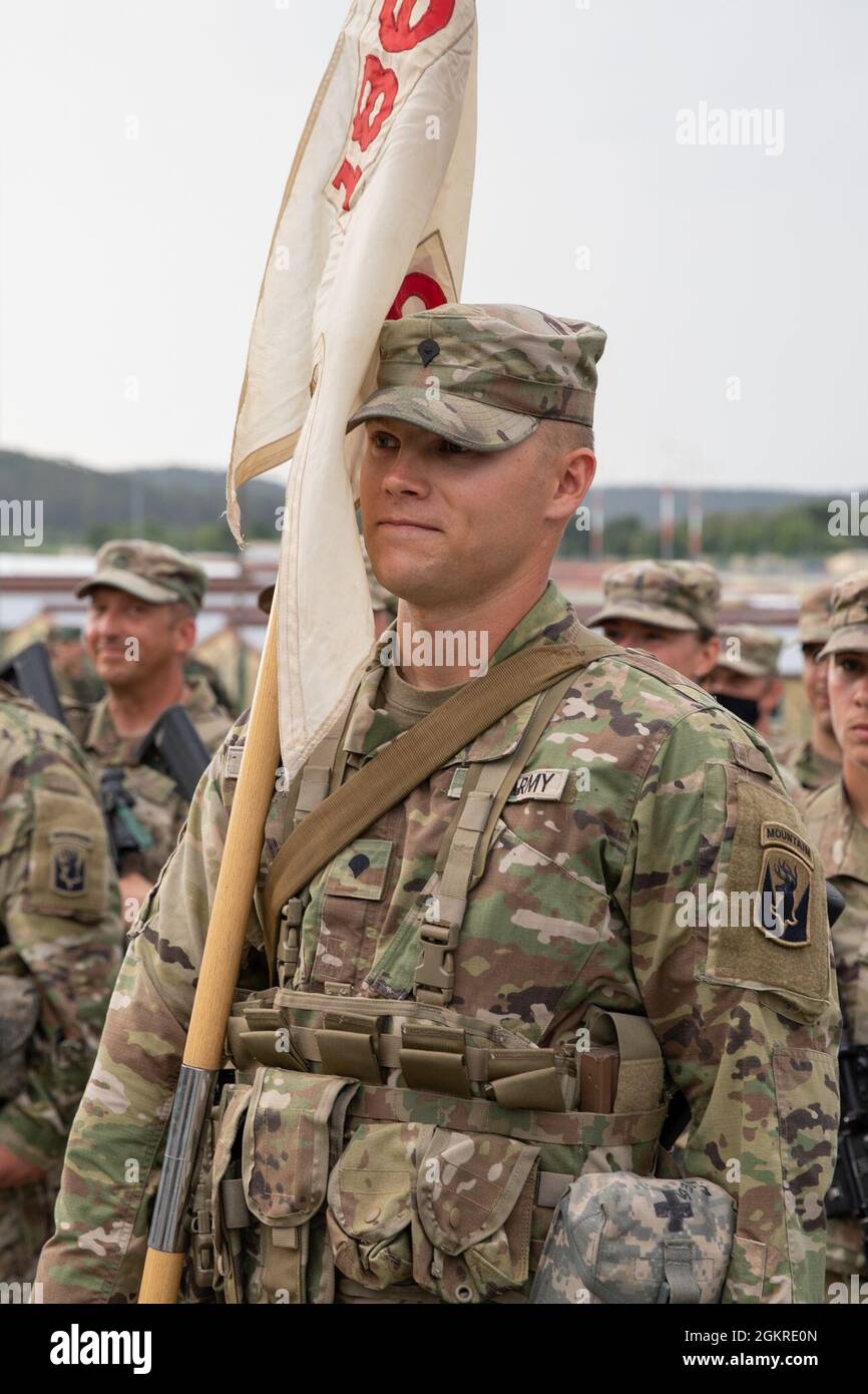 Guidon bearer of the 186th Brigade Support Battalion, 86th Infantry ...