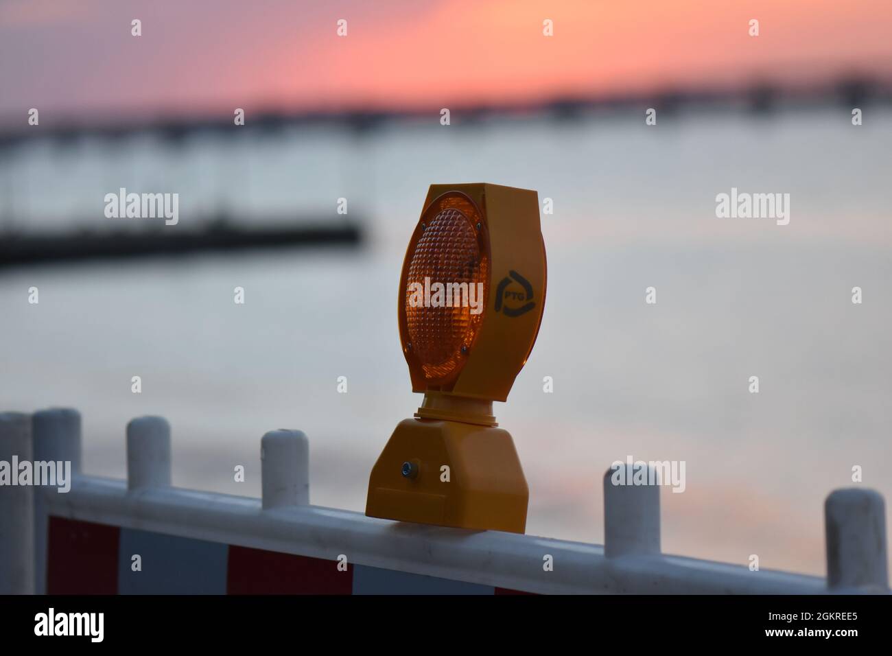 Selective focus shot of an orange warning light on a panel Stock Photo ...