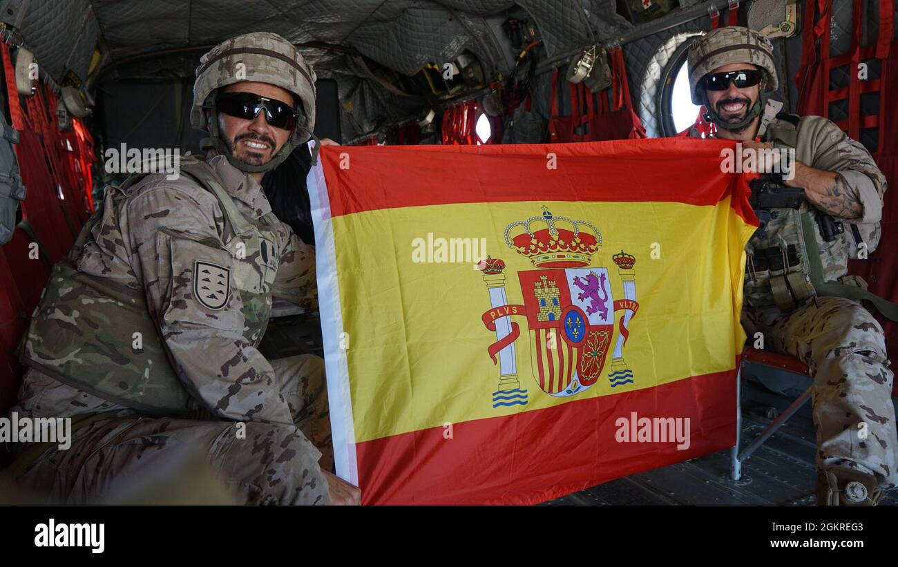 Spanish Soldiers with Task Force Toro display their national flag in ...