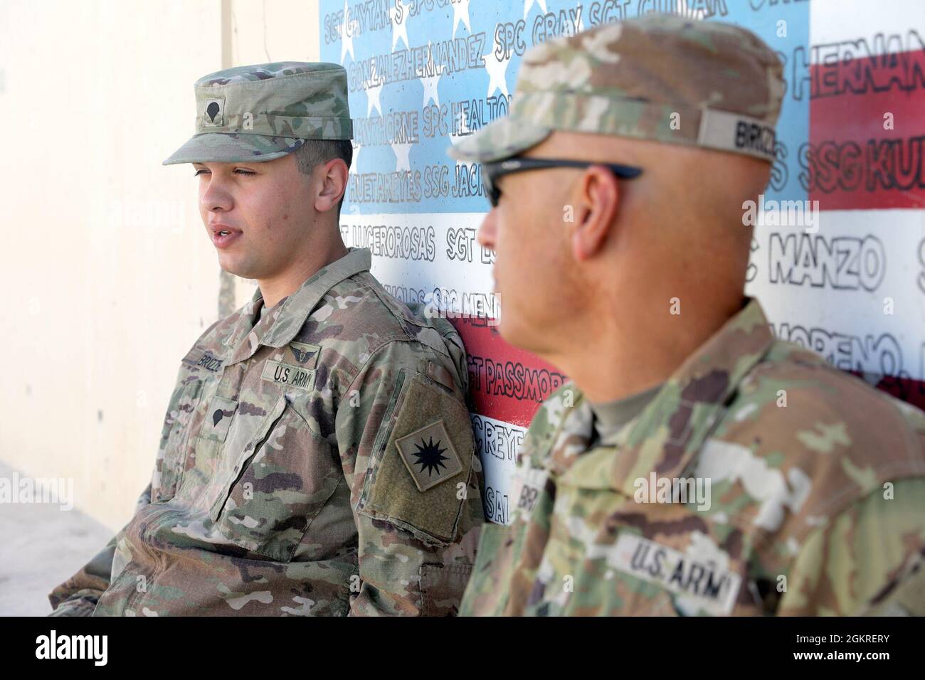Spc. Sean Brizzie, left, a CH-47 Chinook mechanic with Bravo Company ...