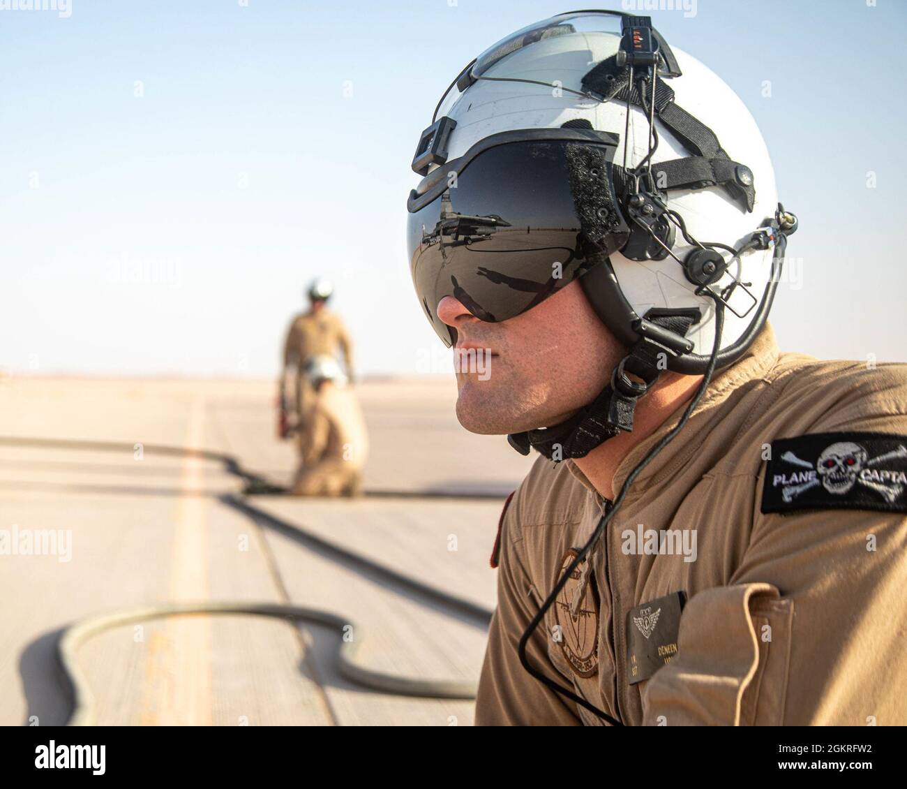 A U.S. Marine with Marine Aerial Refueler Transport Squadron 352 ...