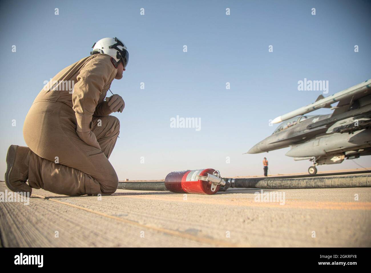 A U.S. Marine with Marine Aerial Refueler Transport Squadron 352 ...