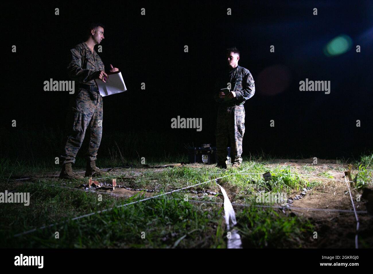 U.S. Marine Corps Maj. Matthew Hanks, left, and Capt. Conor Keating ...