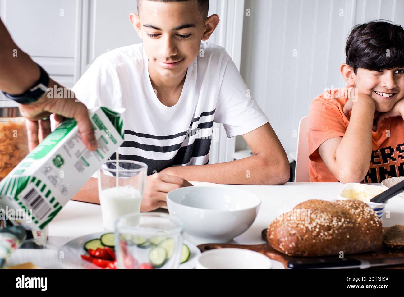 Two boys, brothers, eating breakfast in the morning. Photo: Isabell ...