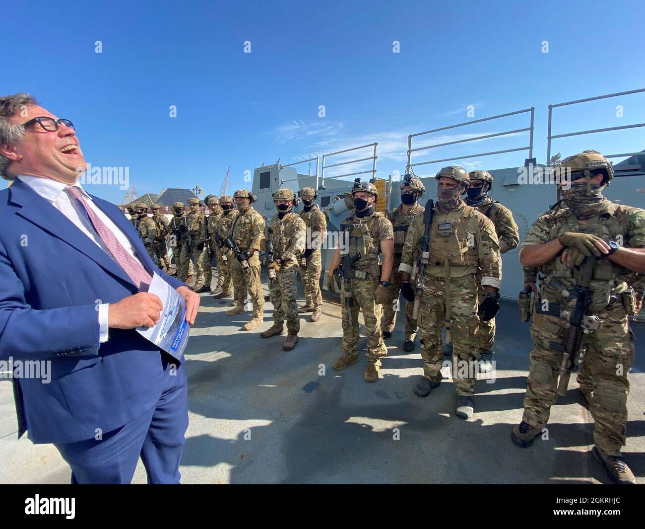 Britain’s Minister for Defence Procure-mentor Jeremy Quin Congratulates ...