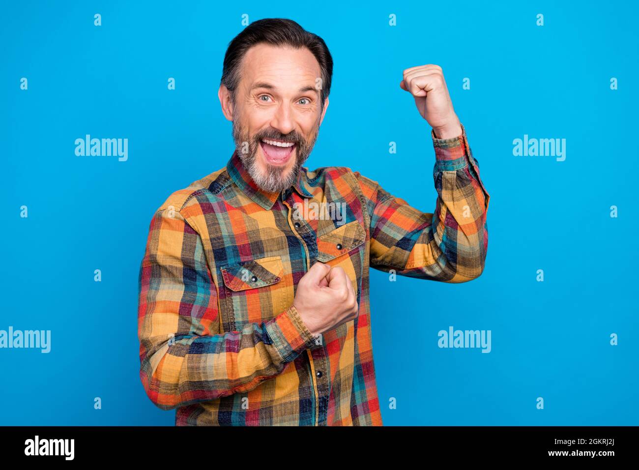 Photo portrait man smiling gesturing like winner overjoyed isolated ...
