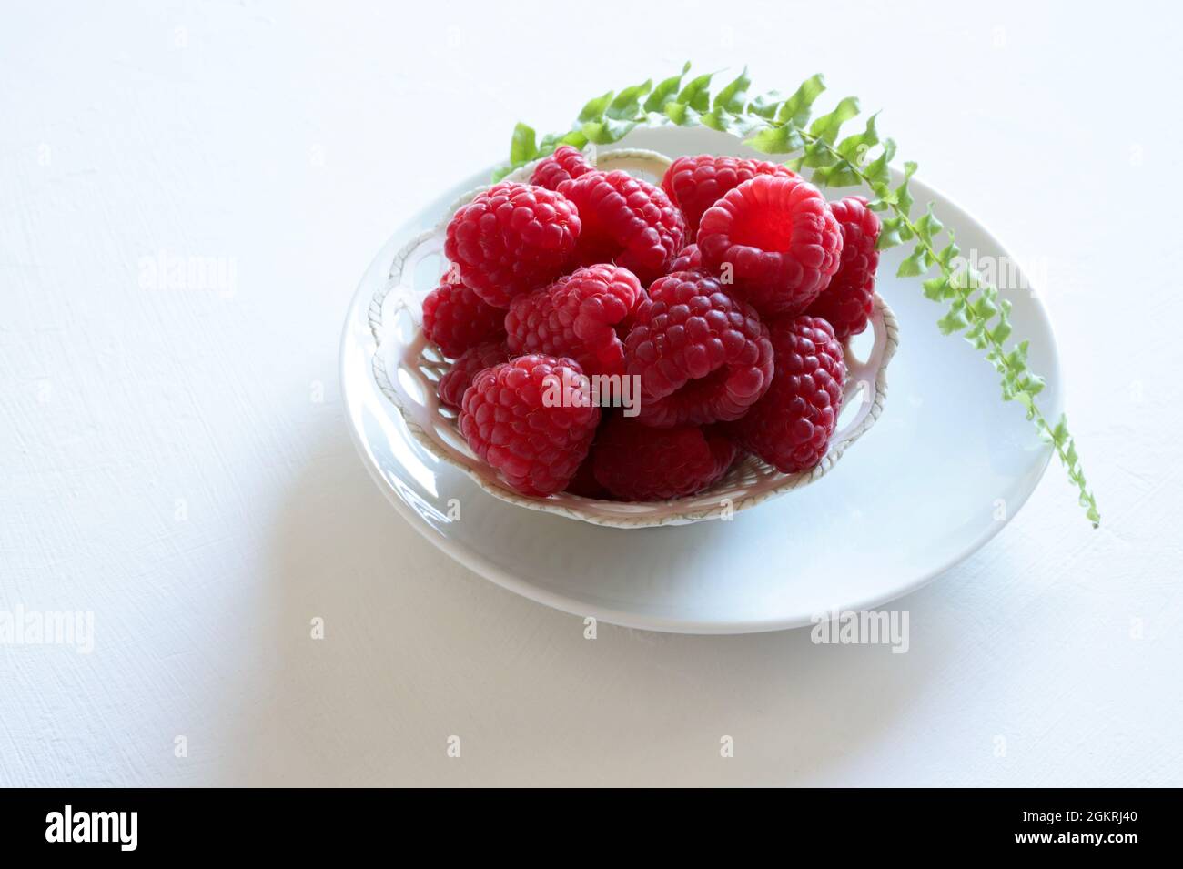 Fresh raspberries isolated on white background. Directly above Stock ...