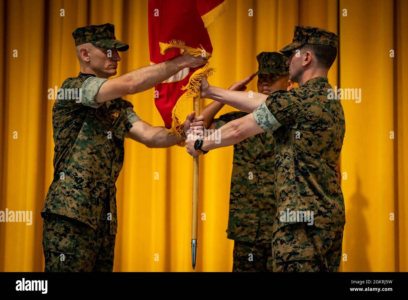U.S. Marine Corps Lt. Col. Eric N. Starr, right, the outgoing commander ...
