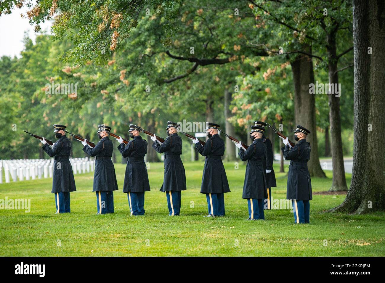 A firing party from the 3d U.S. Infantry Regiment (The Old Guard) fires ...