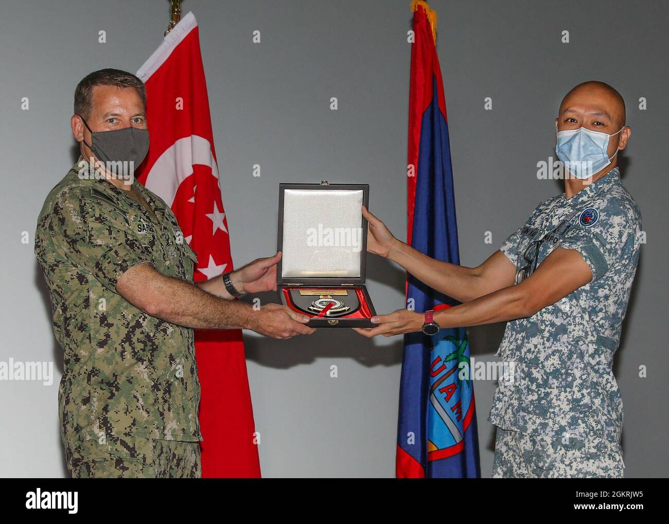 Capt. Chase Sargeant, commander, Task Force 71, poses for a photo with ...