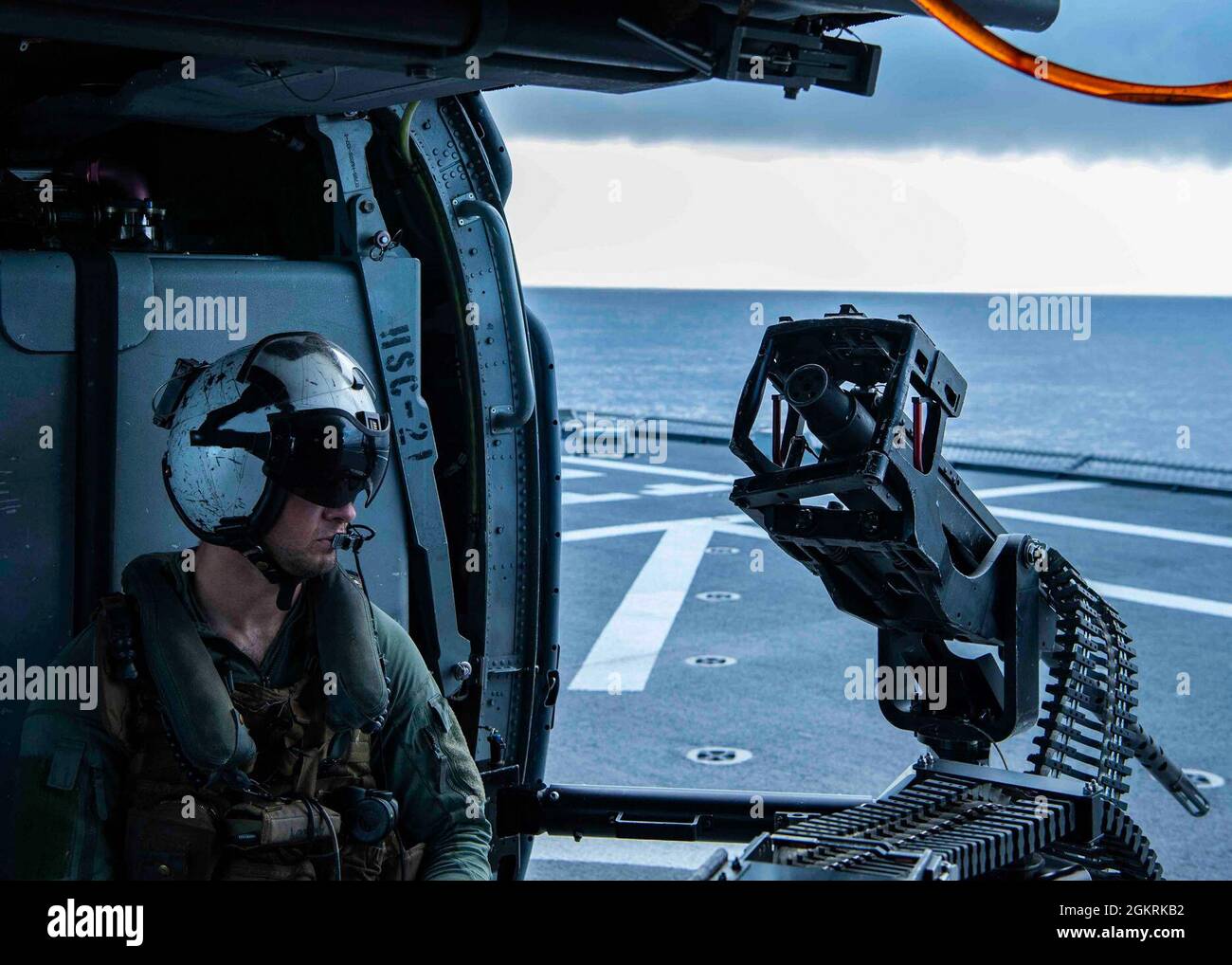 PHILIPPINE SEA (June 22, 2021) Naval Aircrewman (Helicopter) 2nd Class ...