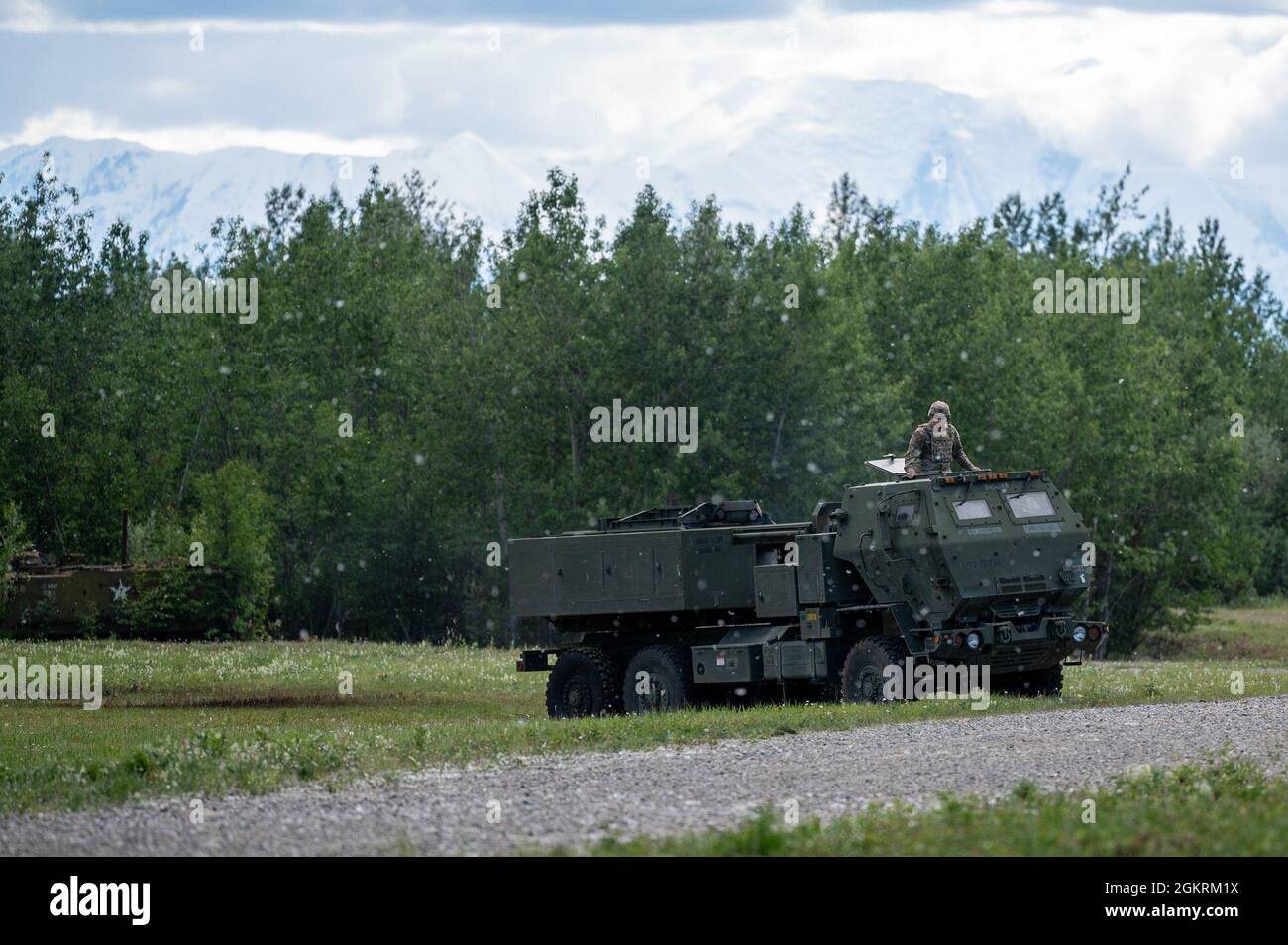 A U.S. Army High Mobility Artillery Rocket System team, assigned to ...