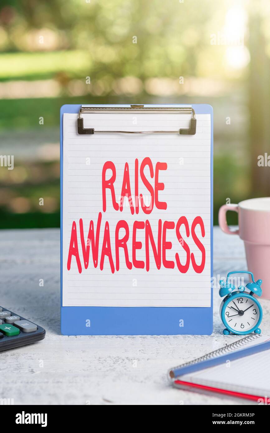 Text showing inspiration Raise Awareness. Business overview creating a ...