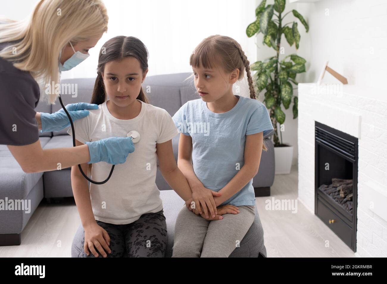 Little girl at the doctor's - pediatric checkup Stock Photo - Alamy