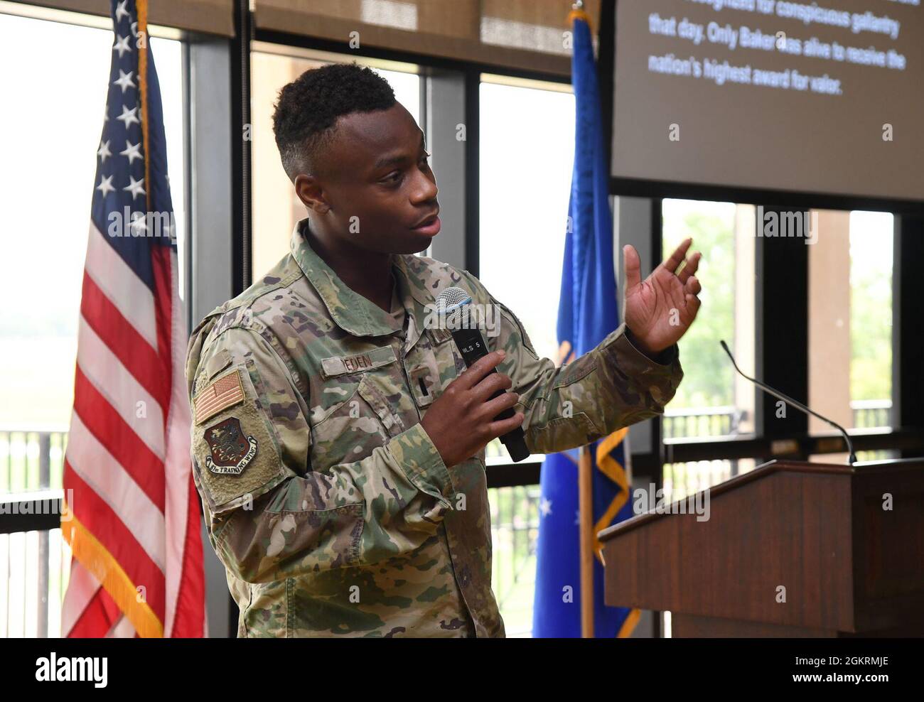 U.S. Air Force 1st Lt. Gerald Peden, Public Affairs Officer, delivers ...