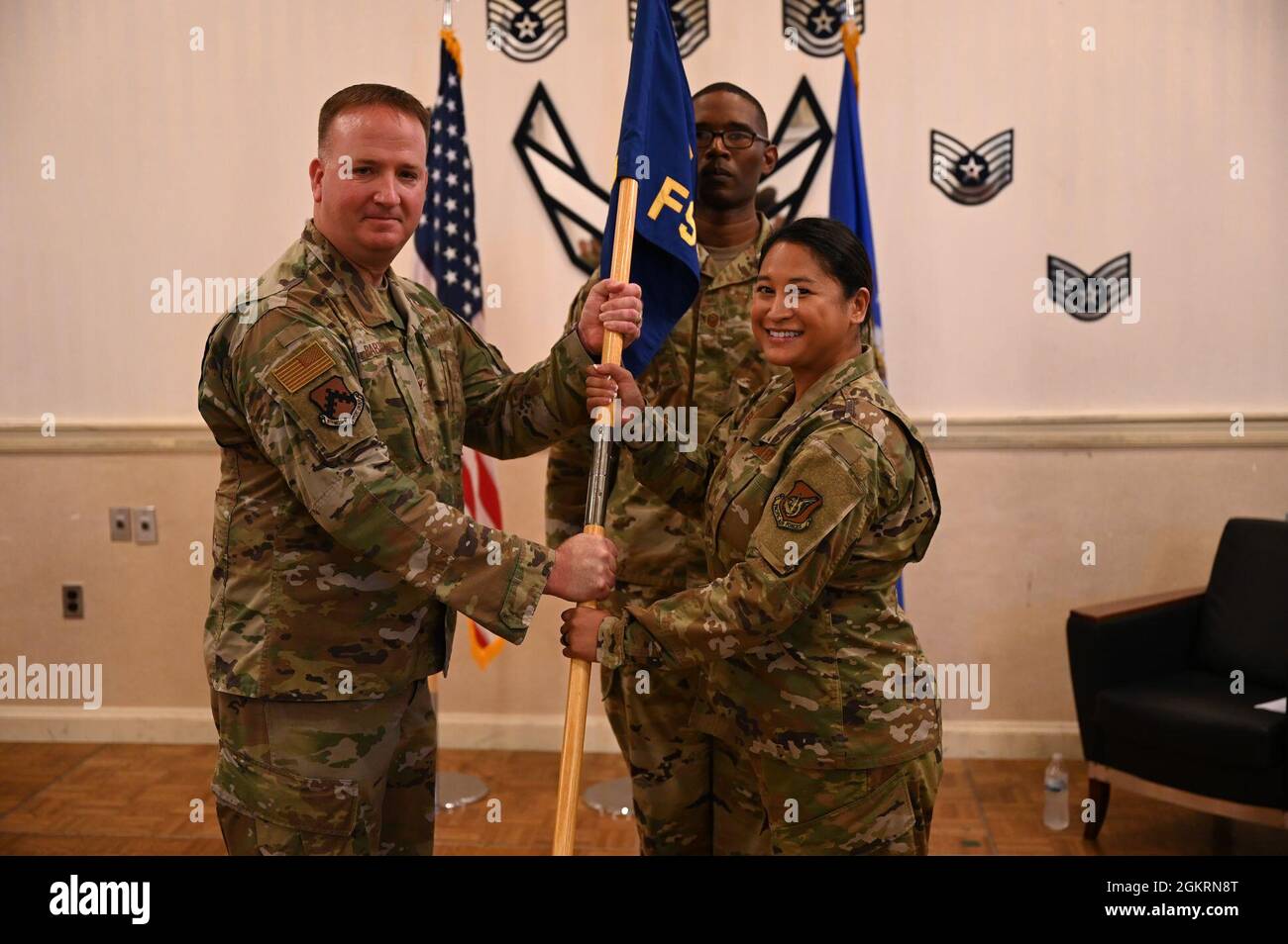 Col. Robert Bartlow, 8th Mission Support Group commander, presents the ...
