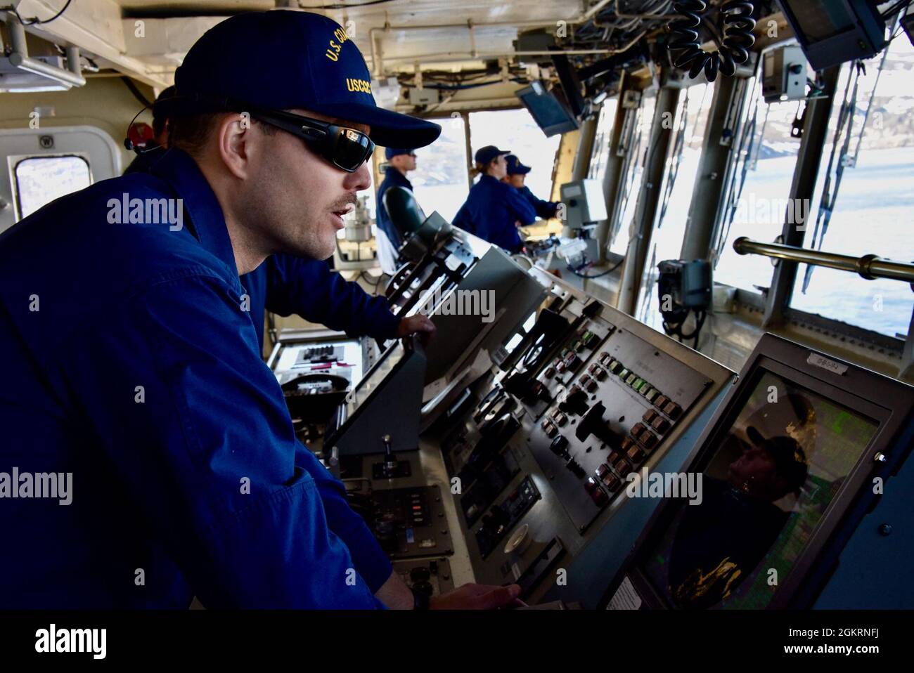 The USCGC Maple (WLB 207) crew participate in a hoisting exercise with ...