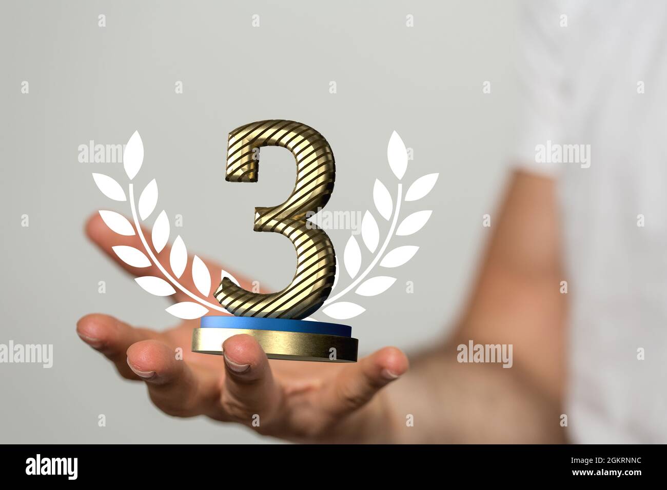 3d rendering of a third-place award with a laurel wreath in a hand on a ...
