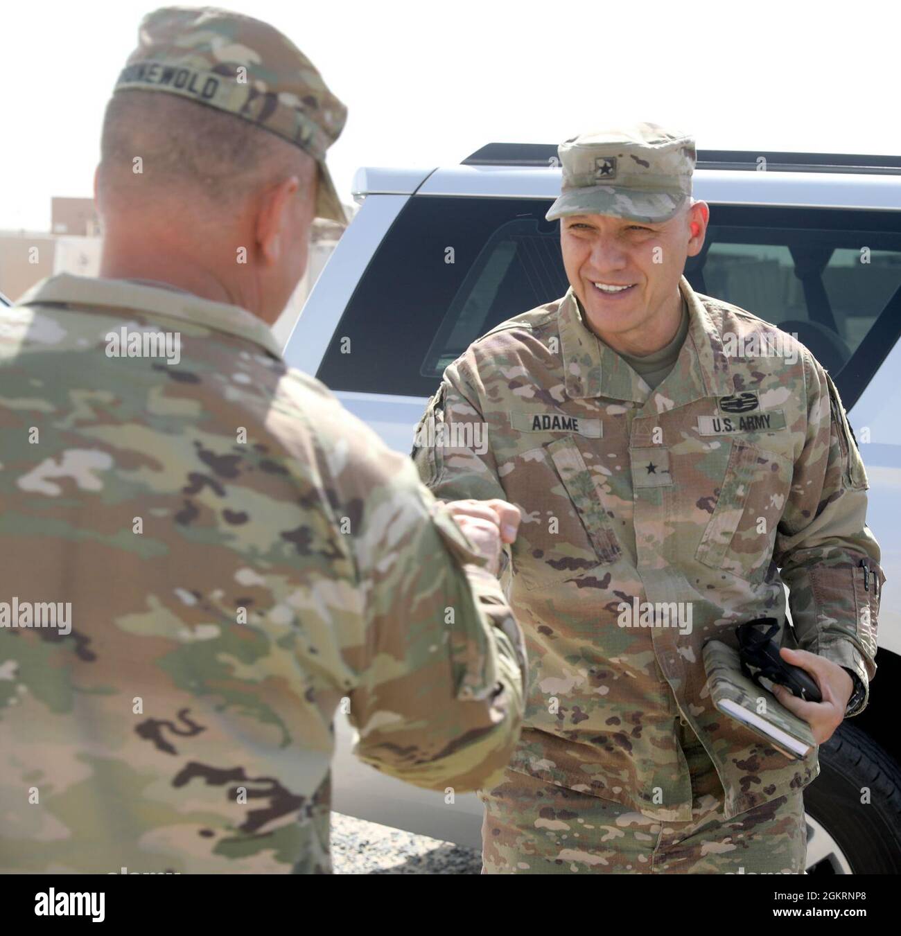 Brig. Gen. Michael Adame, right, 36th Infantry Division Deputy ...