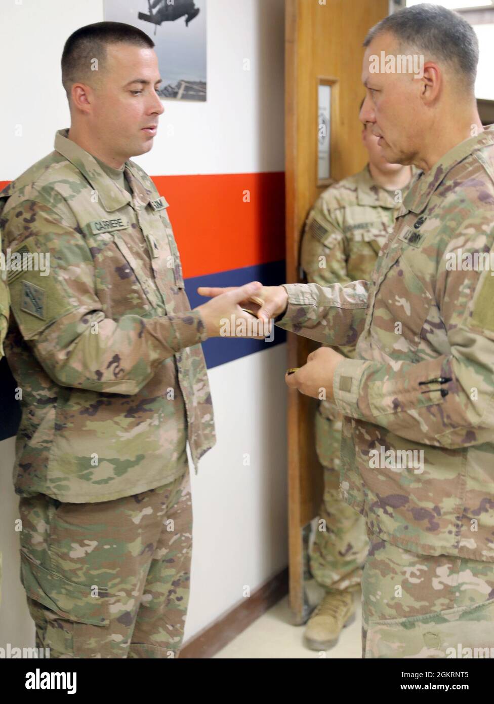 Sgt. Brandon Carriere, left, a logistics liaison officer with Bravo ...