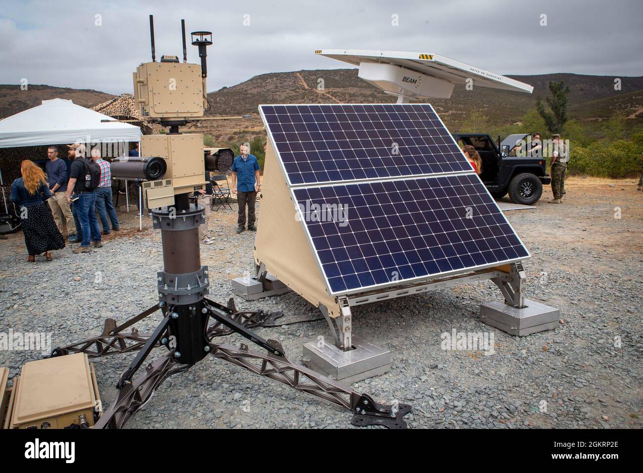 Attendees observe the Anduril Sentry Tower during the NavalX SoCal Tech Bridge's Electric and ...