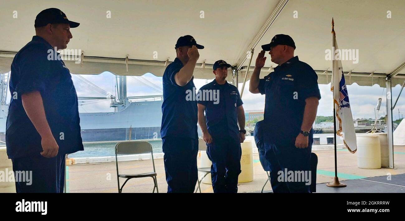 Capt. Clinton Carlson relieves Capt. Adam Morrison as the commanding ...