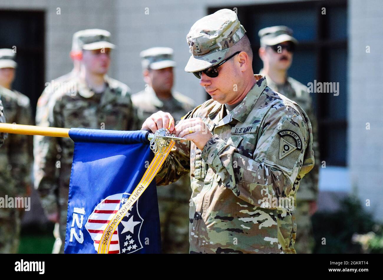 Chief Warrant Officer 2 Joseph Lewis, commander of the 122nd Army Band ...