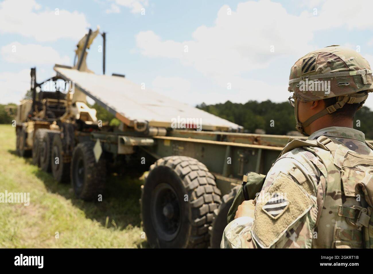 A motor transport operator with Charlie Company, 87th Division ...