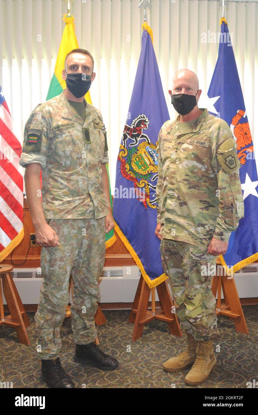 Command Sgt. Maj. Skirmantas Marcinkevičius, left, Lithuanian Land ...