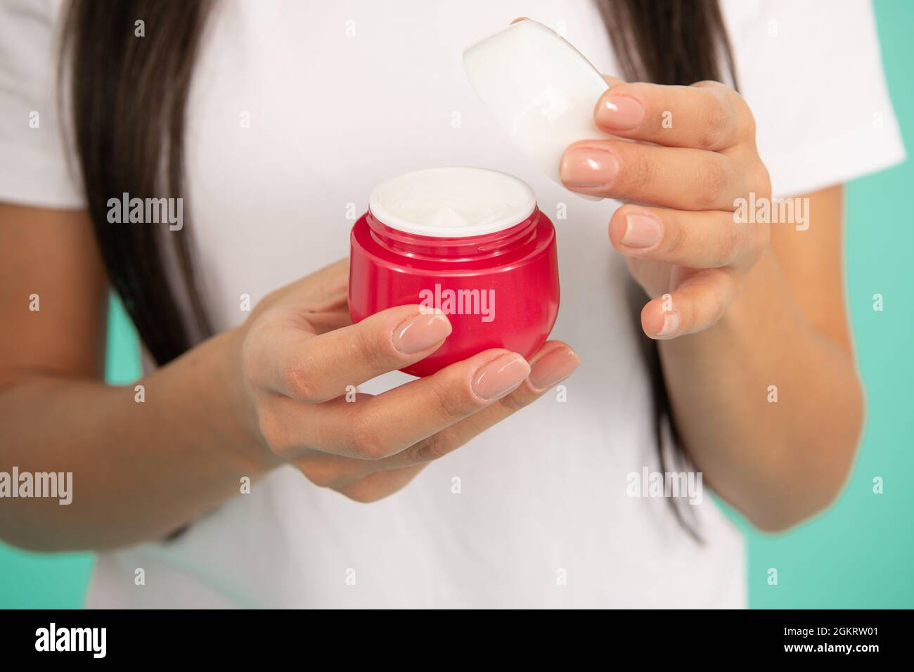 presenting cosmetic product for skin. open hand cream. hand manicure ...