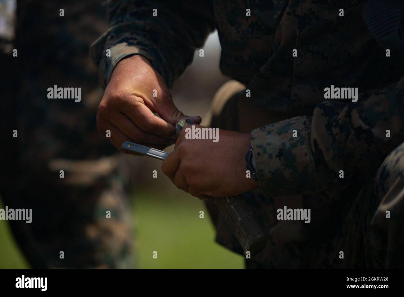 U.S. Marine Corps Pfc. Xavier Alicea, a student with Echo Company ...