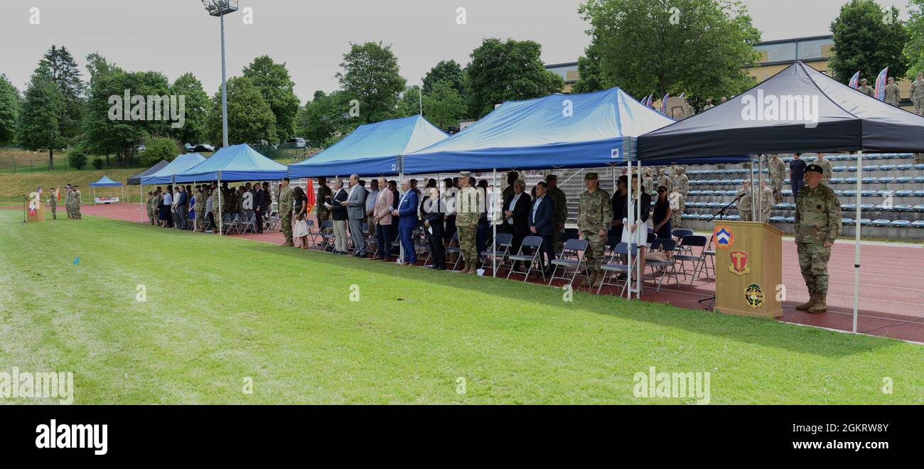 U.S. Soldiers, family, friends and distinguished visitors attend the ...