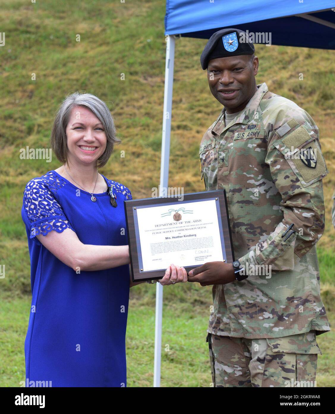 U.S. Army Brig. Gen. James M. Smith, commander of the 21st Theater Sustainment Command and Mrs ...