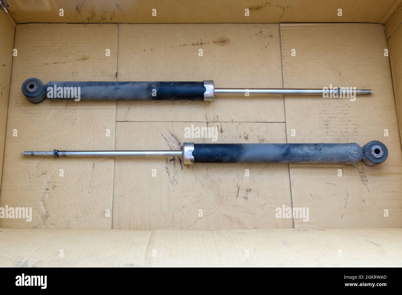 The old shock absorber in the crate box that was removed from a small ...
