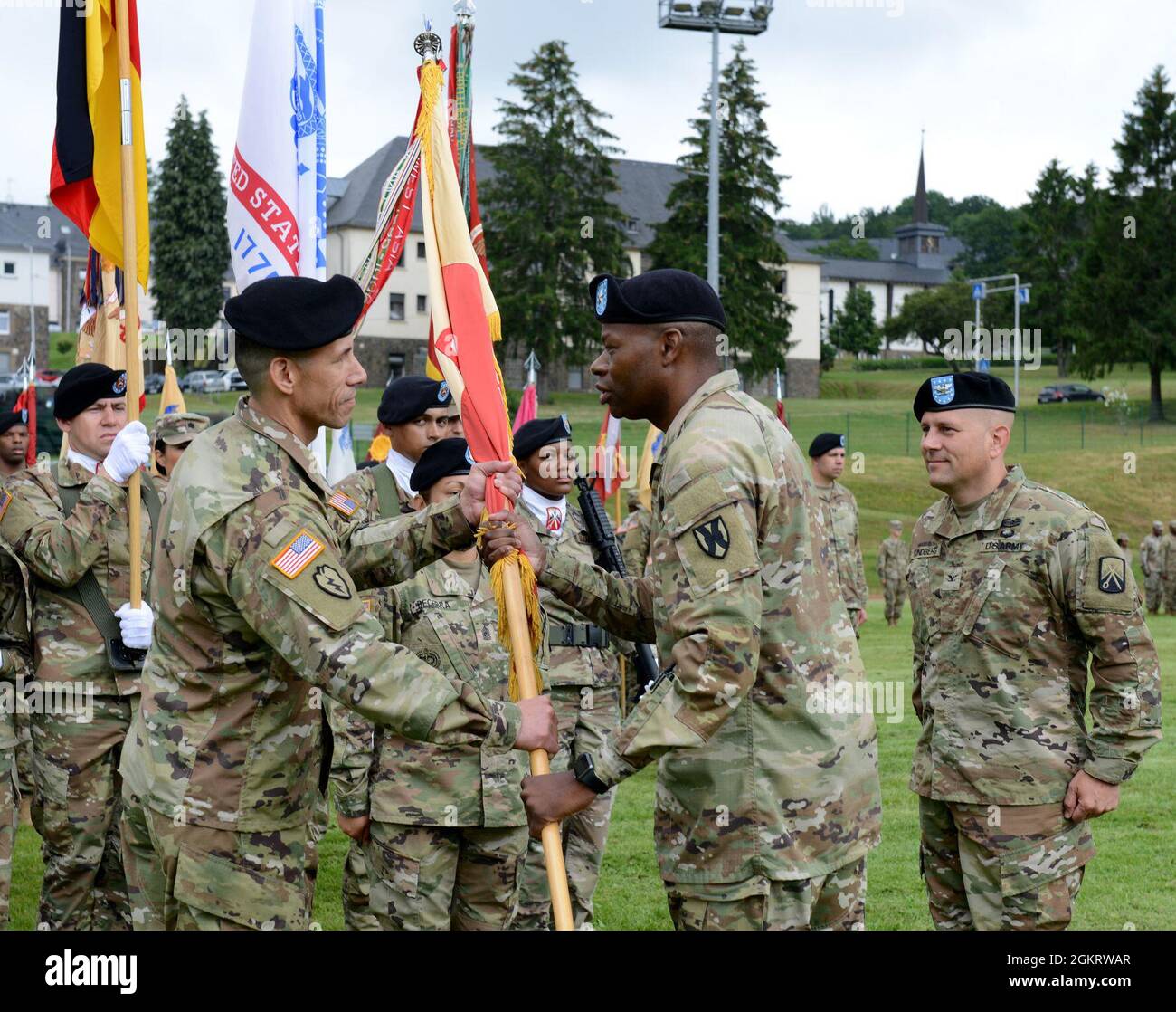 U.S. Army Brig. Gen. James M. Smith, commander of the 21st Theater Sustainment Command (right ...