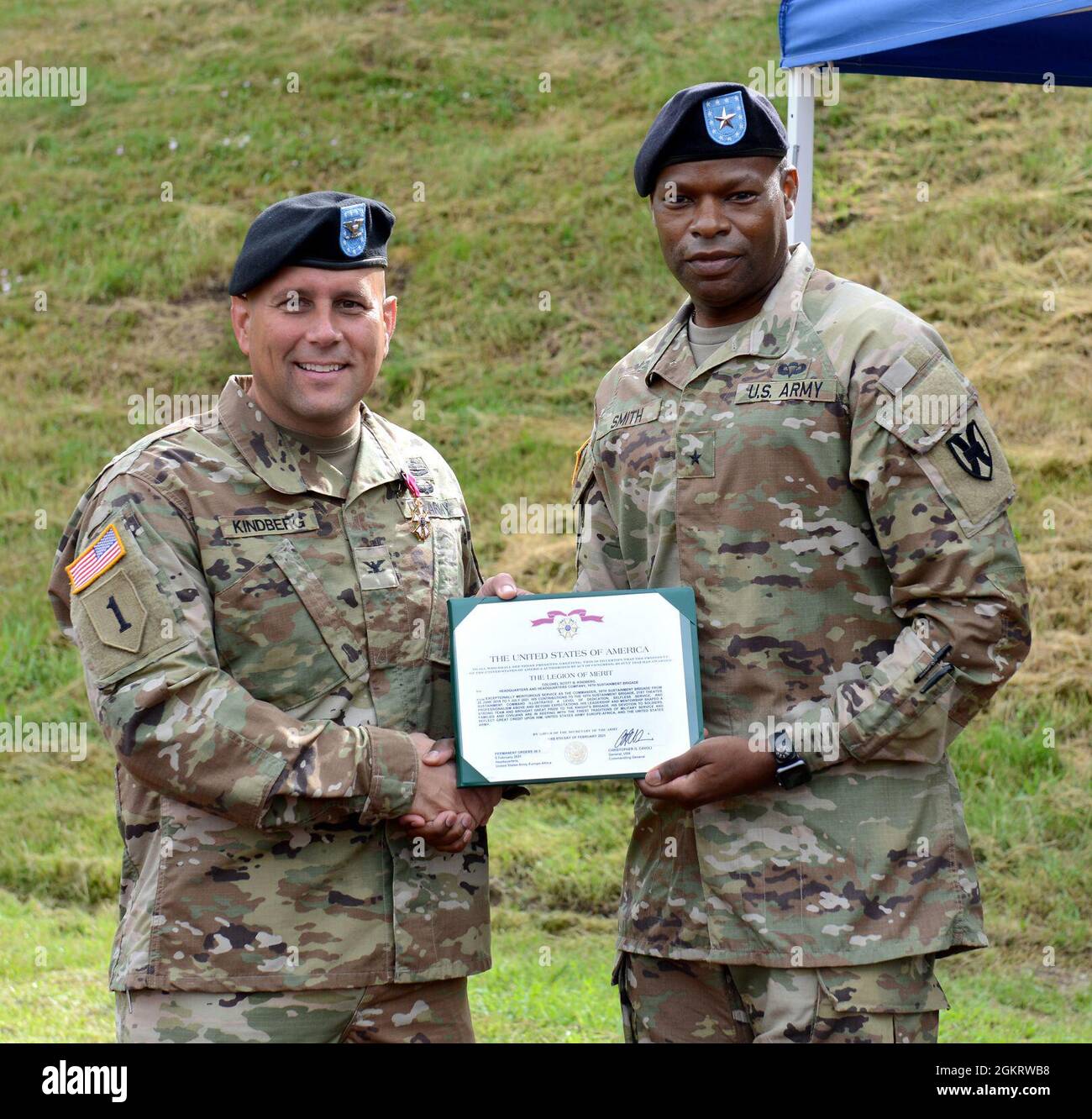U.S. Army Brig. Gen. James M. Smith (right), commander of the 21st Theater Sustainment Command ...