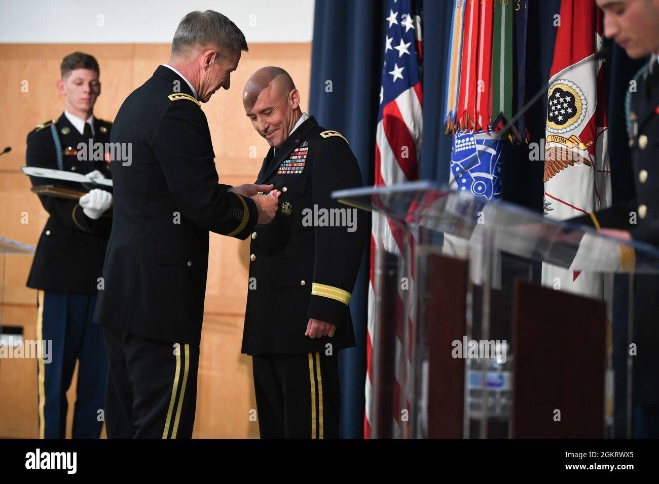 U.S. Army Gen. James C. McConville presents the Distinguished Service ...