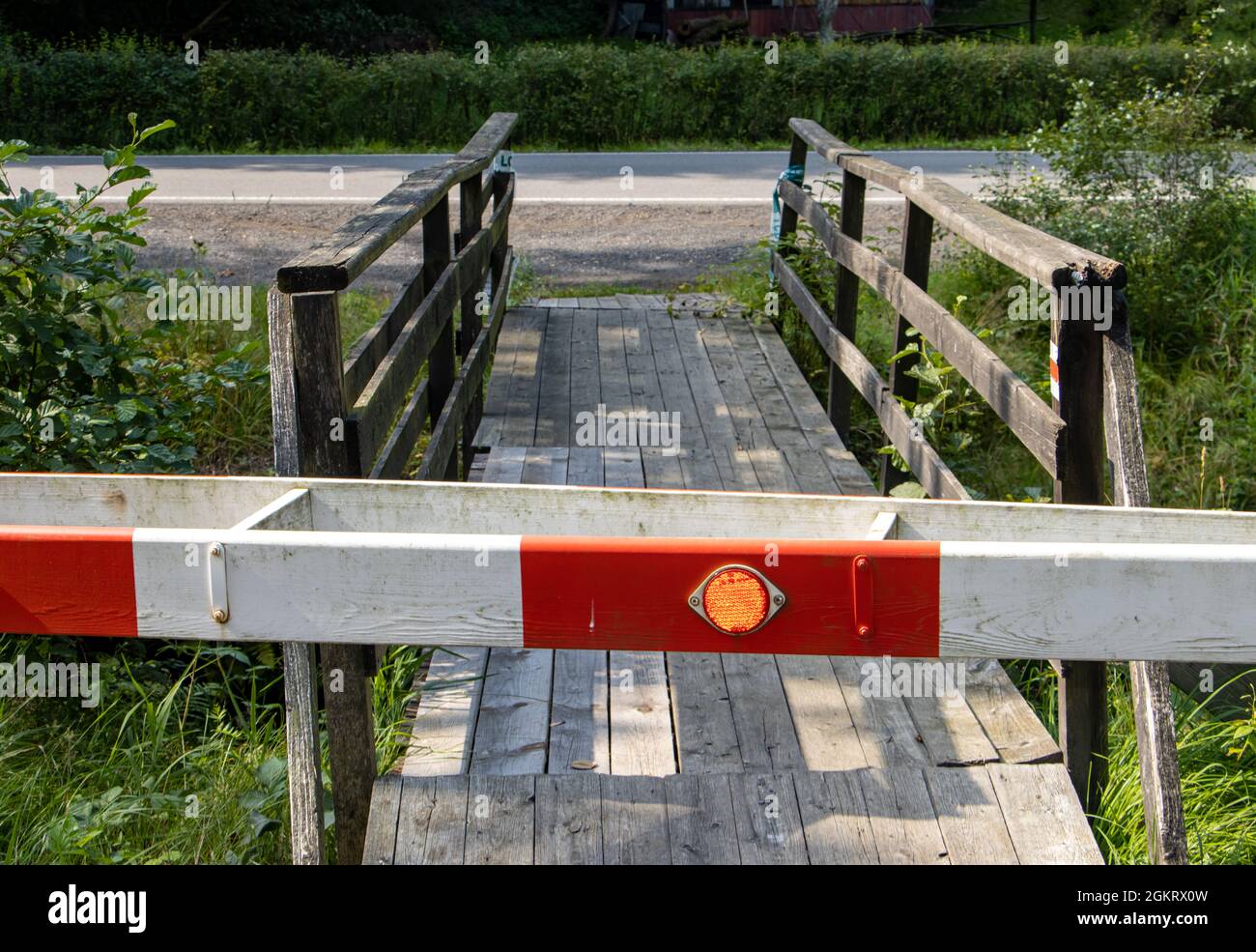 A barrier in front of a footbridge Stock Photo - Alamy