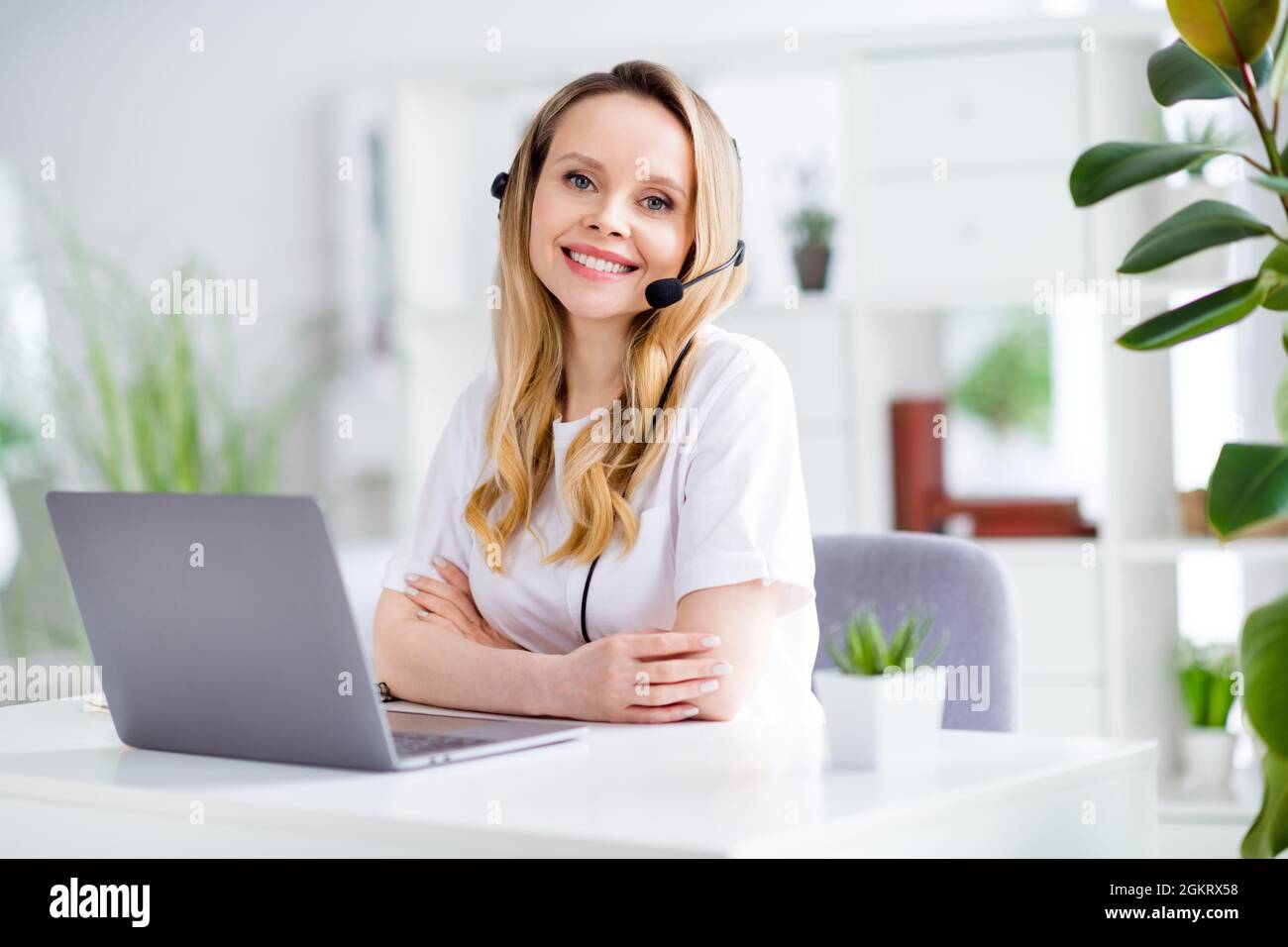 Photo of young woman happy positive smile headphones speak talk help ...