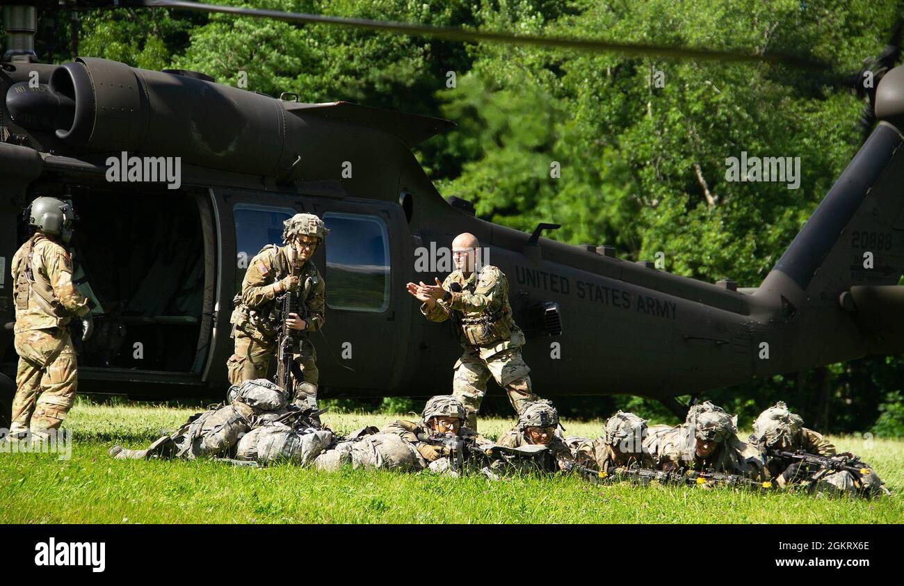 Capt. Curt Lane (Right, standing) directed Class of 2024 cadets as they ...