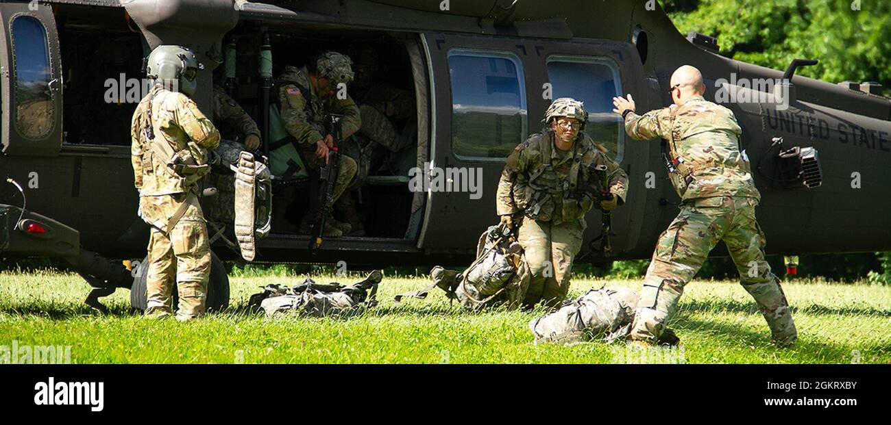 Capt. Curt Lane (Right, standing) directed Class of 2024 cadets as they ...
